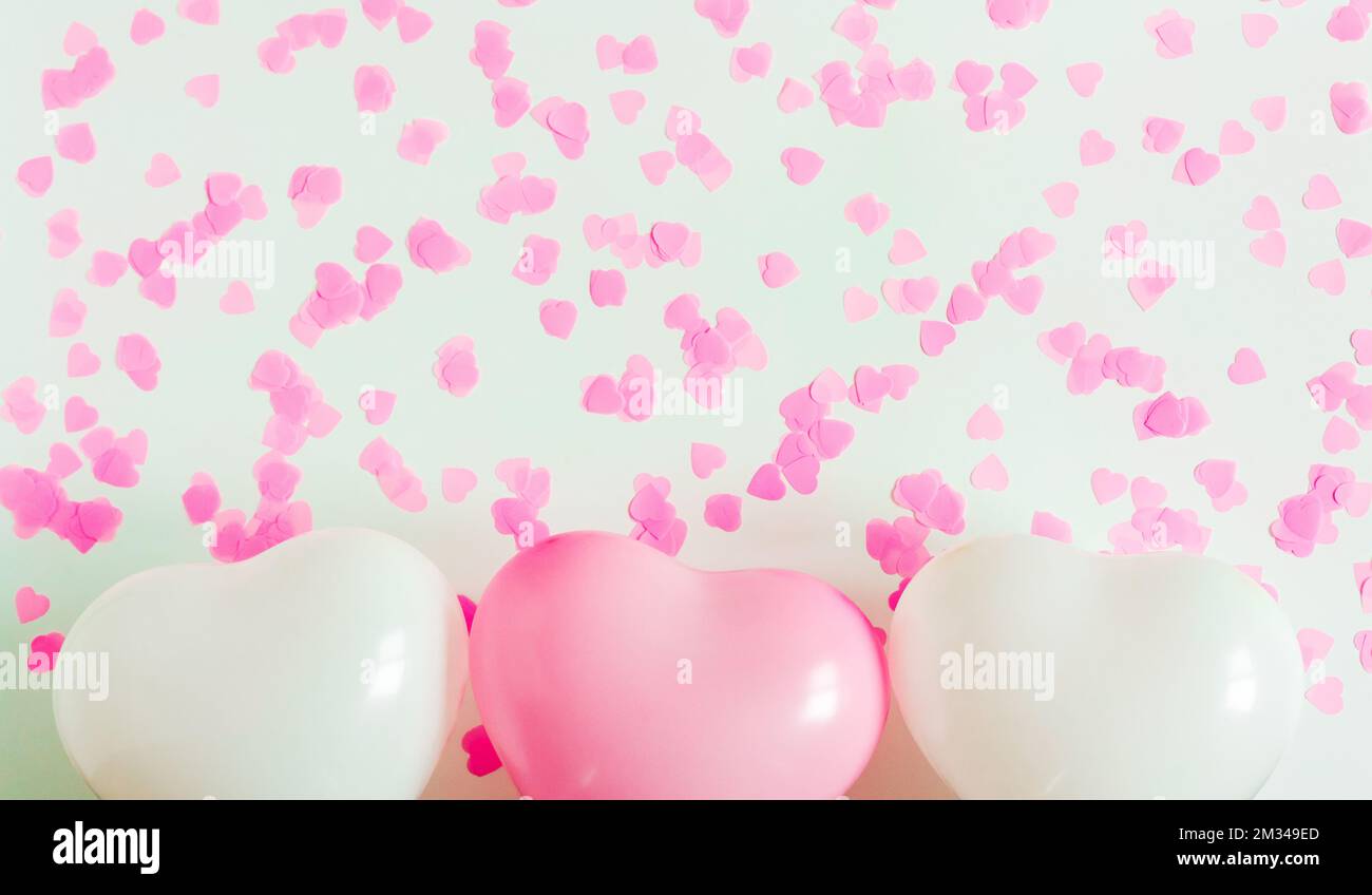 Valentines day composition. White background with white and pink heart ...