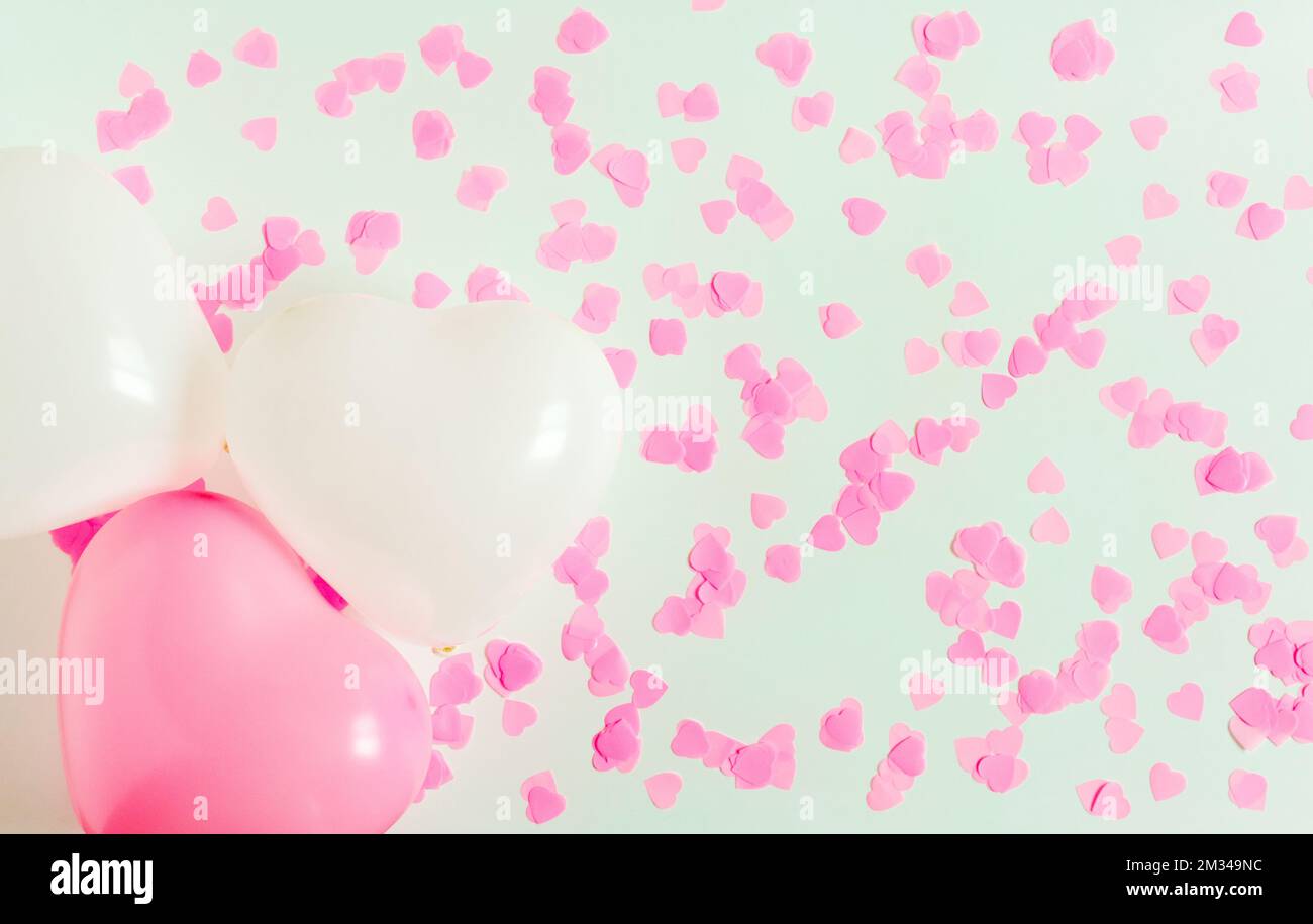 Valentines day composition. White background with white and pink heart ...