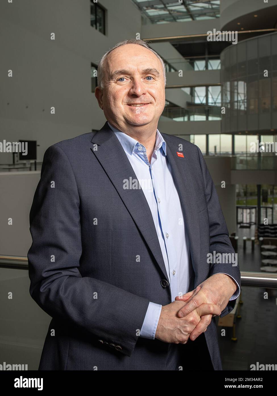 Barco CEO Jan De Witte poses for photographer after a press conference ...