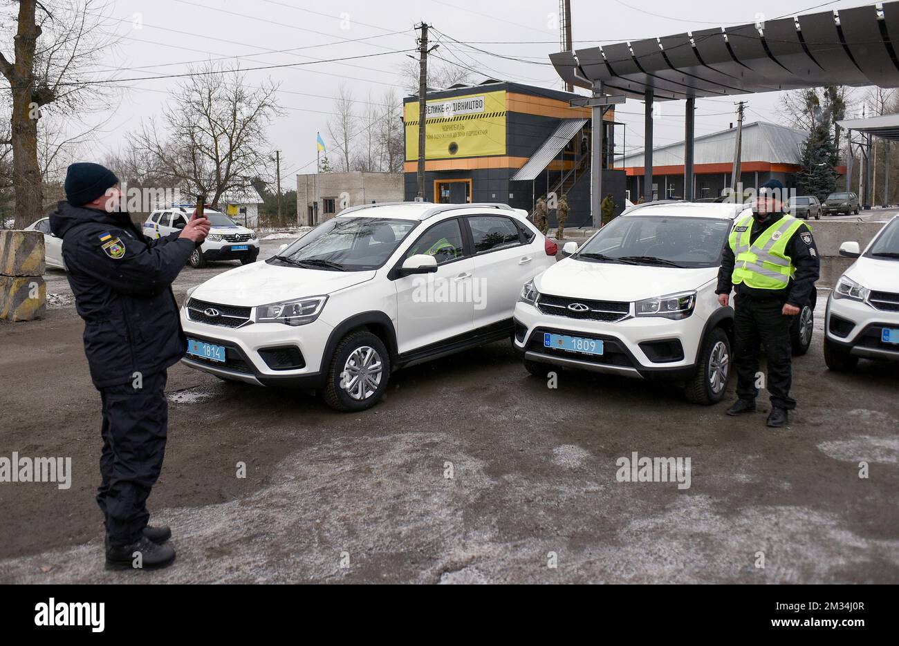 KYIV REGION, UKRAINE - DECEMBER 14, 2022 - A police officer poses for a ...
