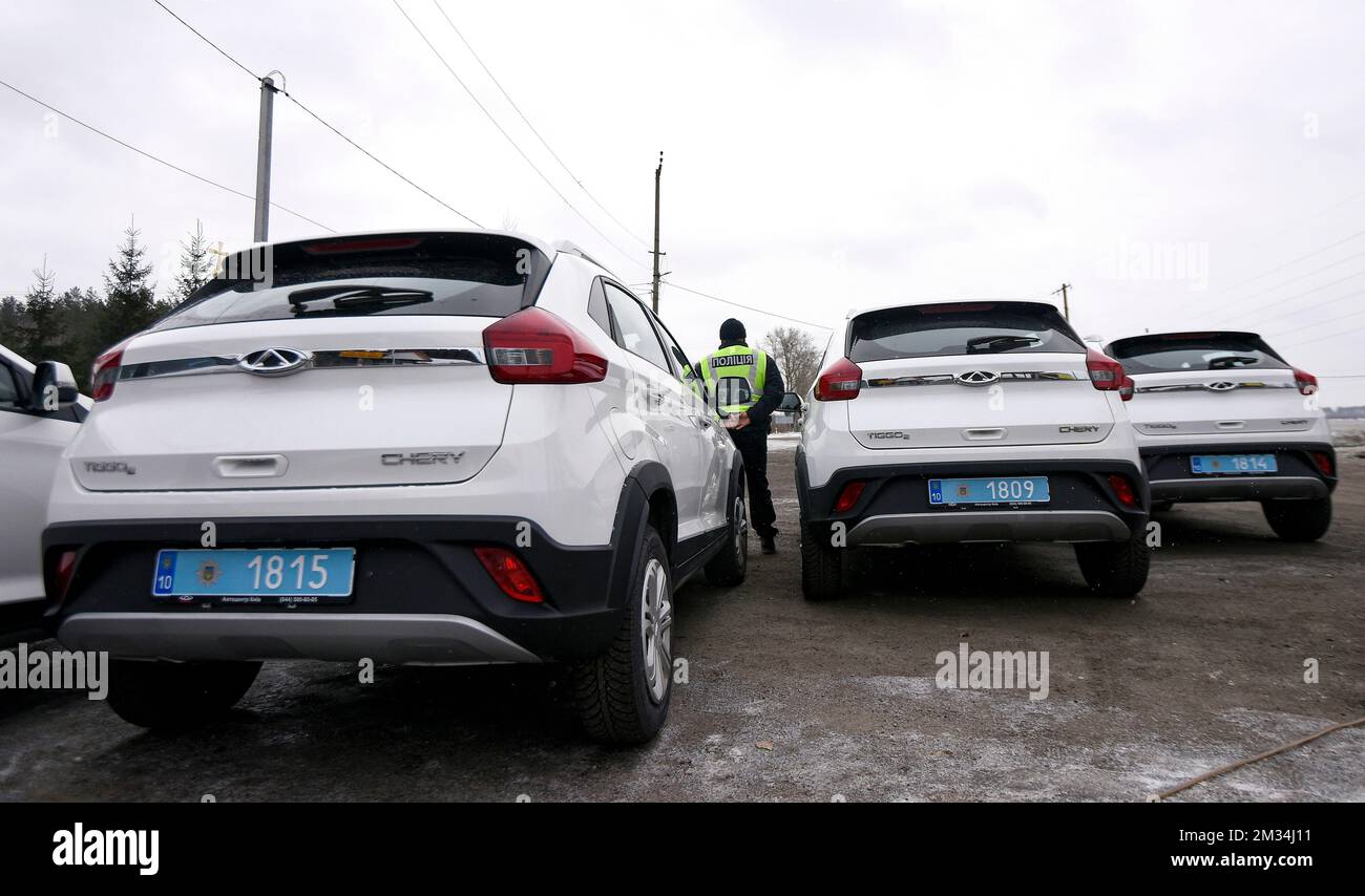 KYIV REGION, UKRAINE - DECEMBER 14, 2022 - A police officer stands by ...