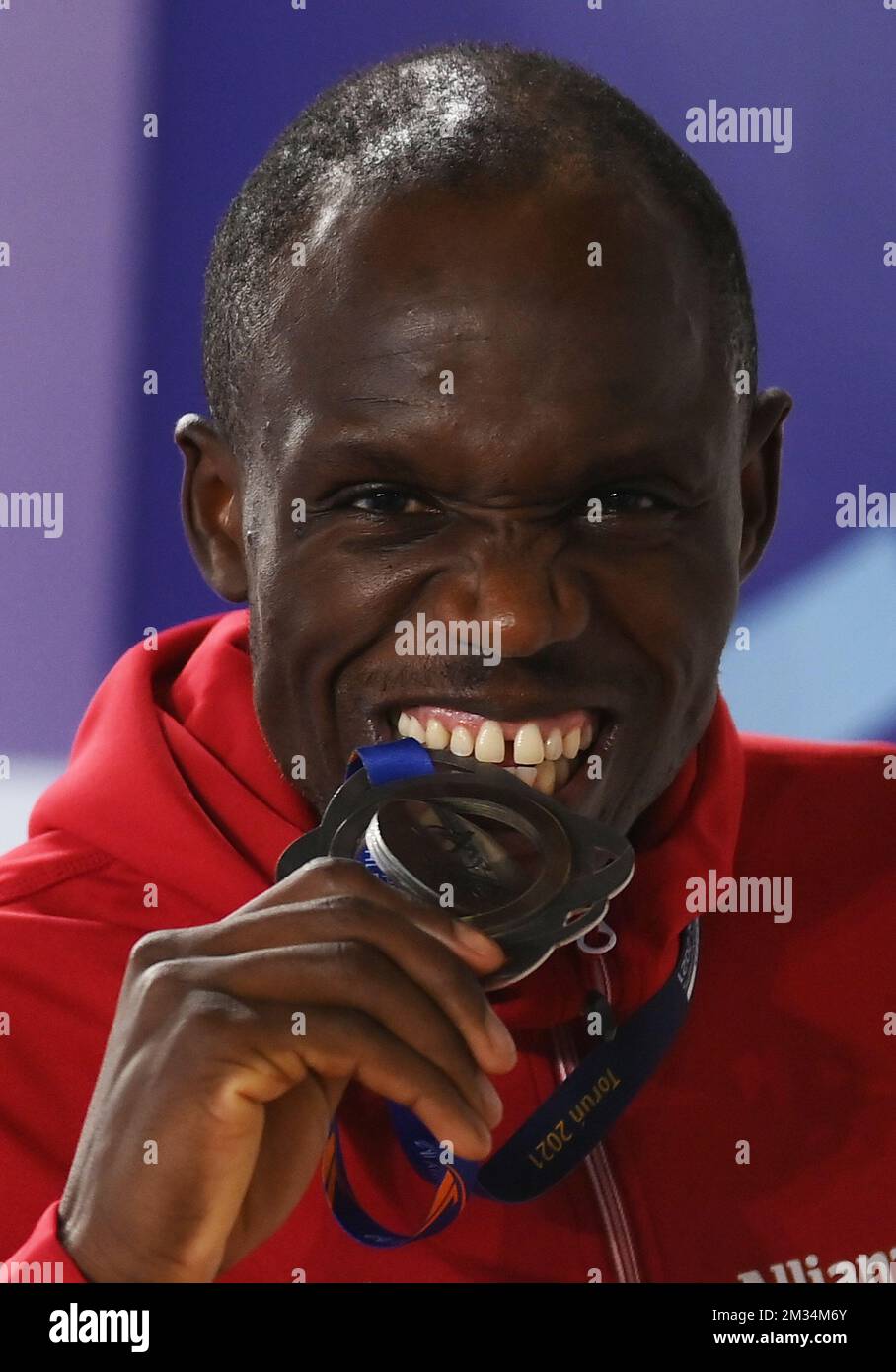 Belgian Isaac Kimeli celebrates on the podium after the men 3000m final ...