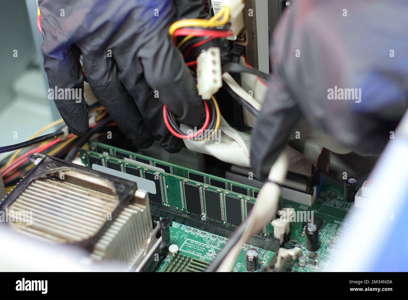 ram memory on the motherboard in an old computer under the cables Stock ...