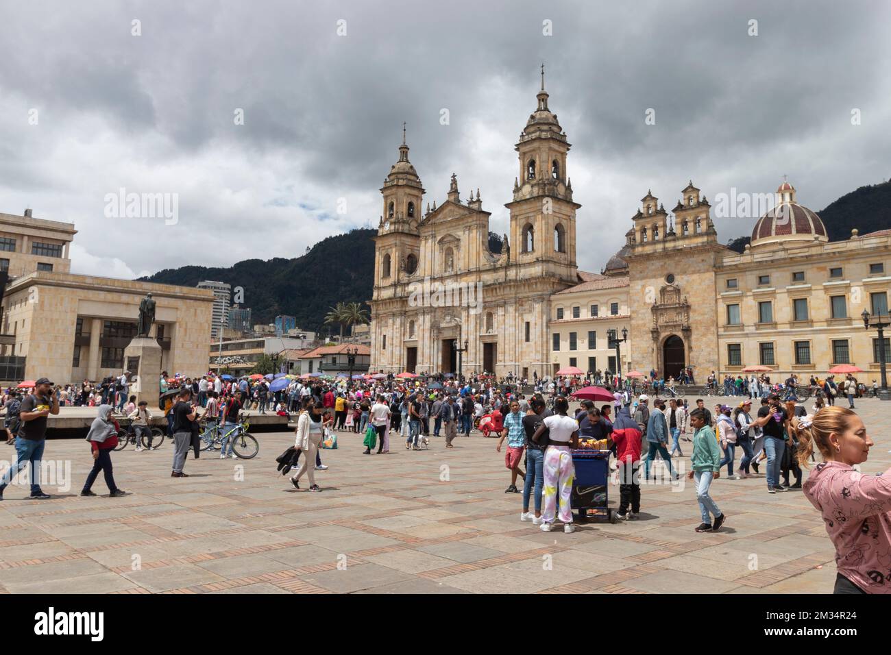 BOGOTA, COLOMBIA People enjoying the sunny day at bolivar square at ...