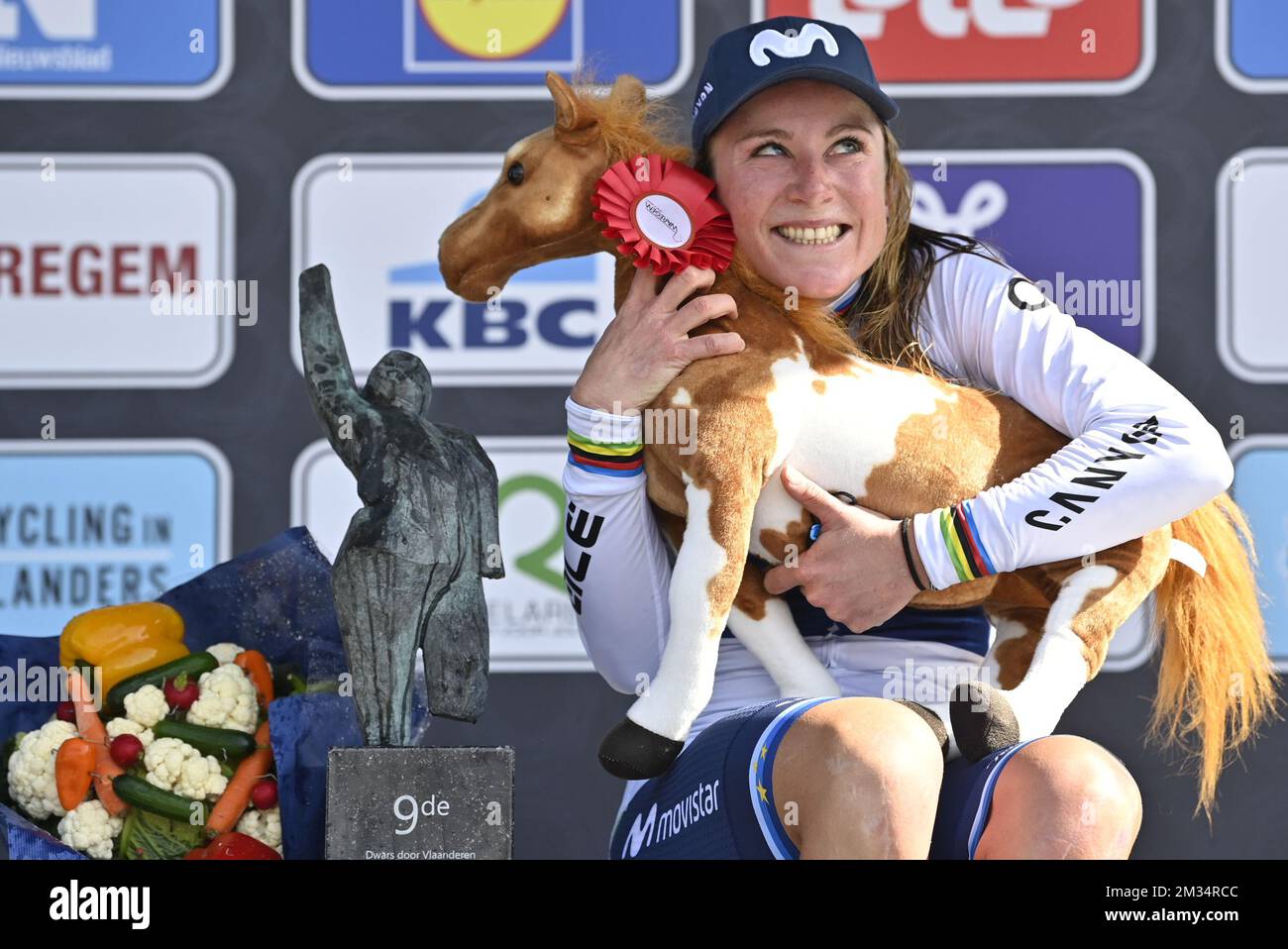 Dutch Annemiek van Vleuten of Movistar Team celebrates on the podium ...