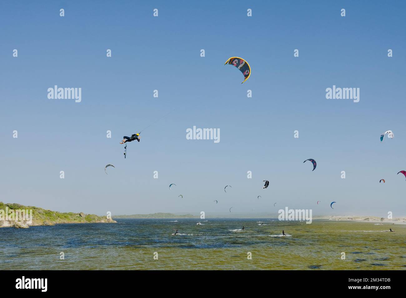 Kite surfers taking advantage of a very windy day on the Klein River ...