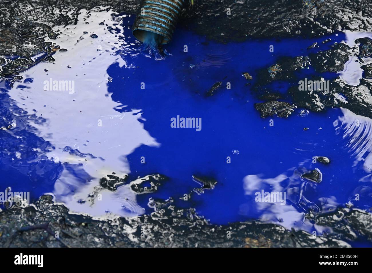 Illustration shows a stream with a blue colour after an ink accidental ...