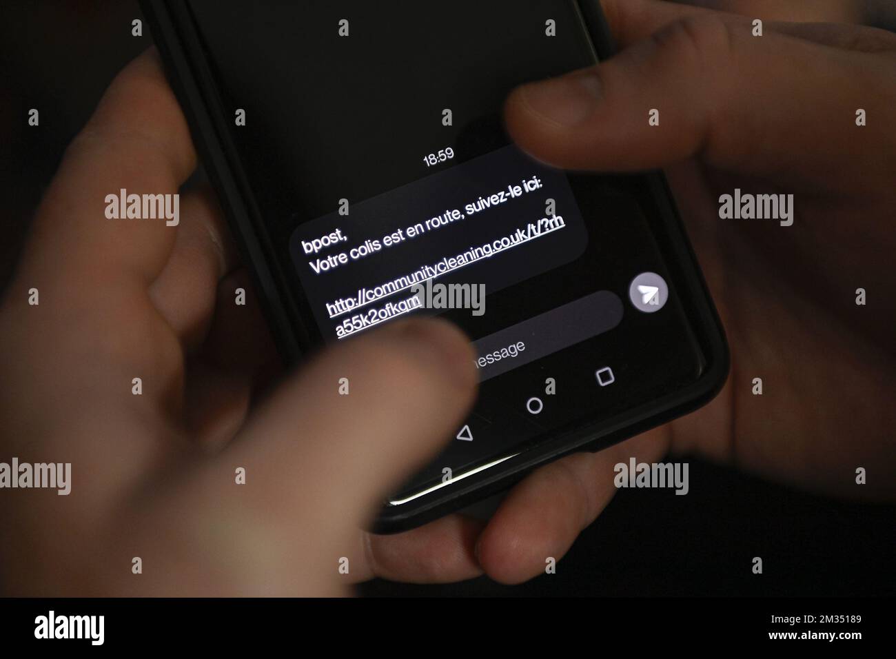 Illustration picture shows a phishing text message send out by ...