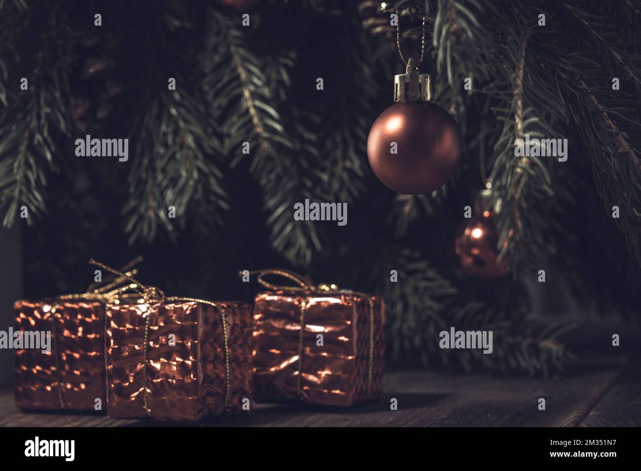 Red Christmas gifts and red ball close-up on the background of the ...