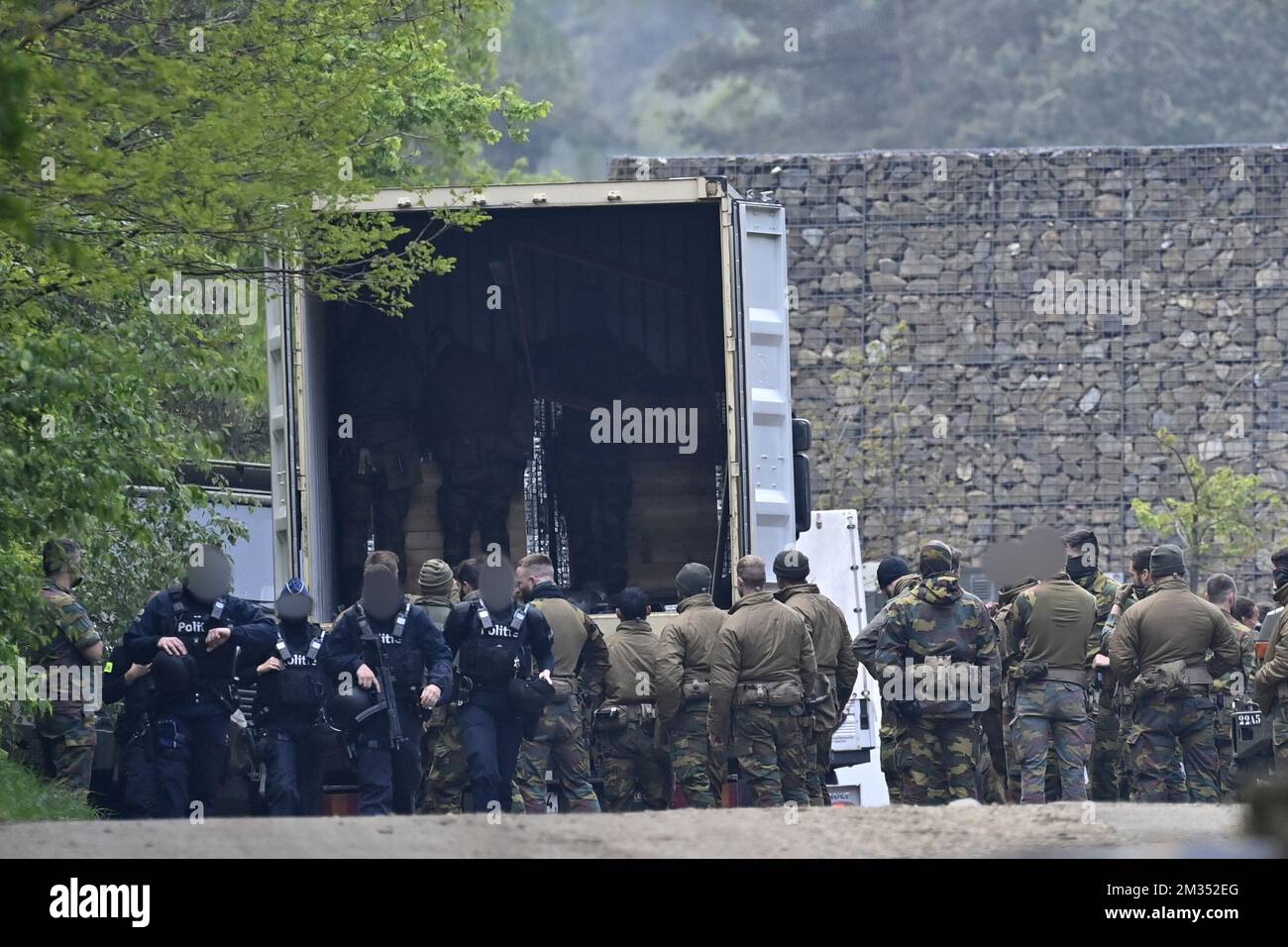 Illustration picture shows heavily armed police and soldiers preparing ...