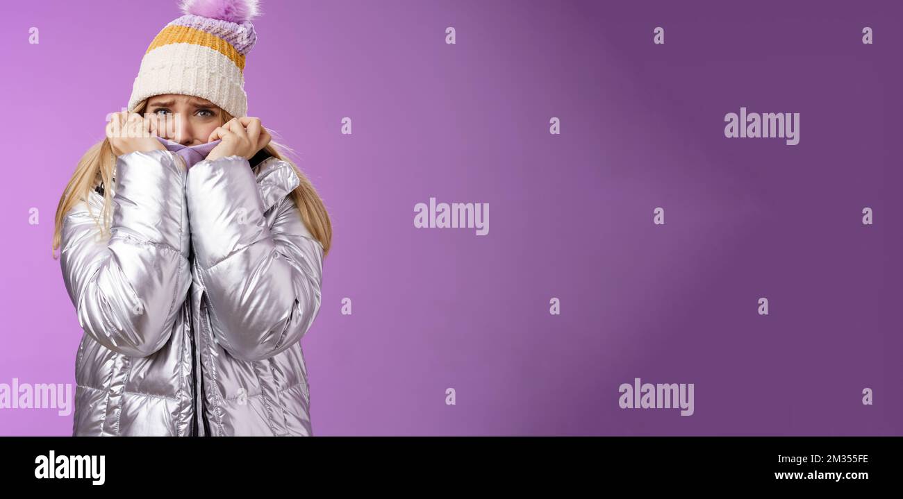 Scared afraid insecure coward girl in cute hat glittering shiny jacket ...