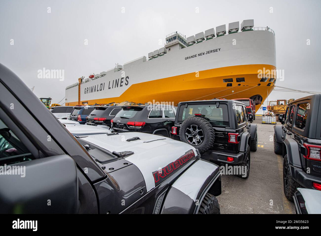 Illustration shows vehicles being prepared for transport at Antwerp ...