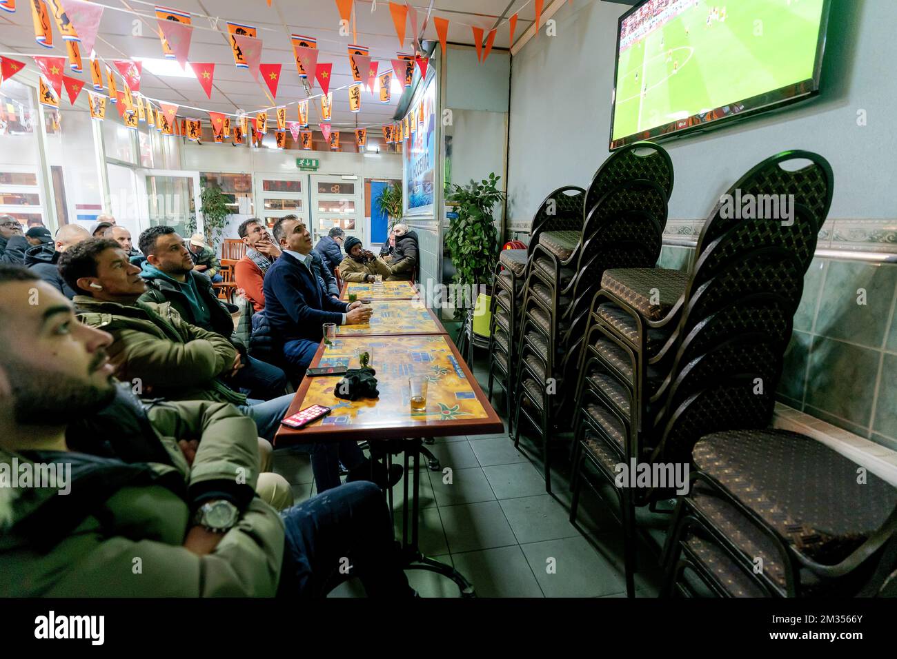 THE HAGUE - Moroccan football supporters watch the match in a Moroccan ...