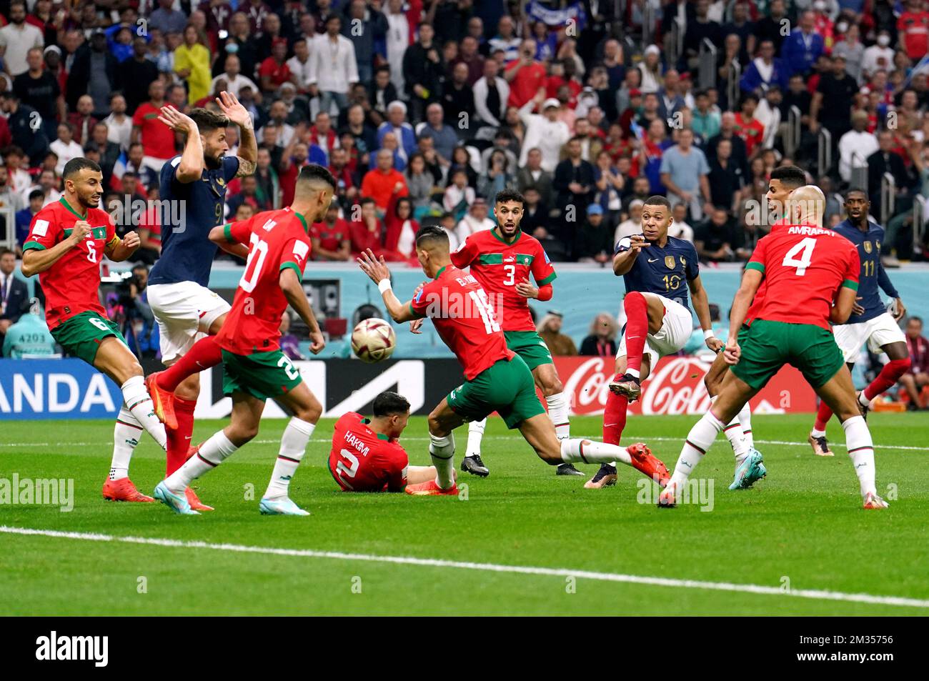 France's Kylian Mbappe attempts a shot on goal before team-mate Theo ...