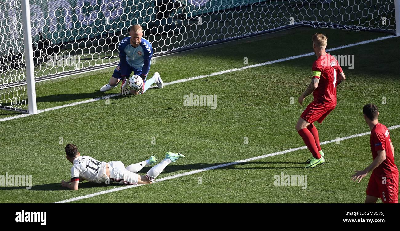Belgium's Dries Mertens and Danish goalkeeper Kasper Schmeichel ...