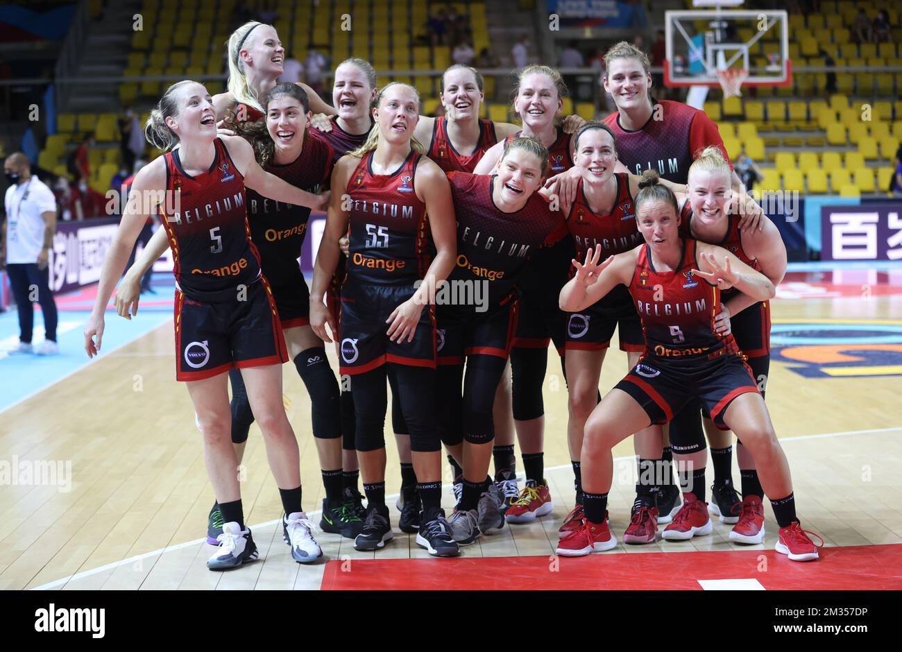 Belgian Cats celebrate after winning the match between Belgium's national women's basketball ...
