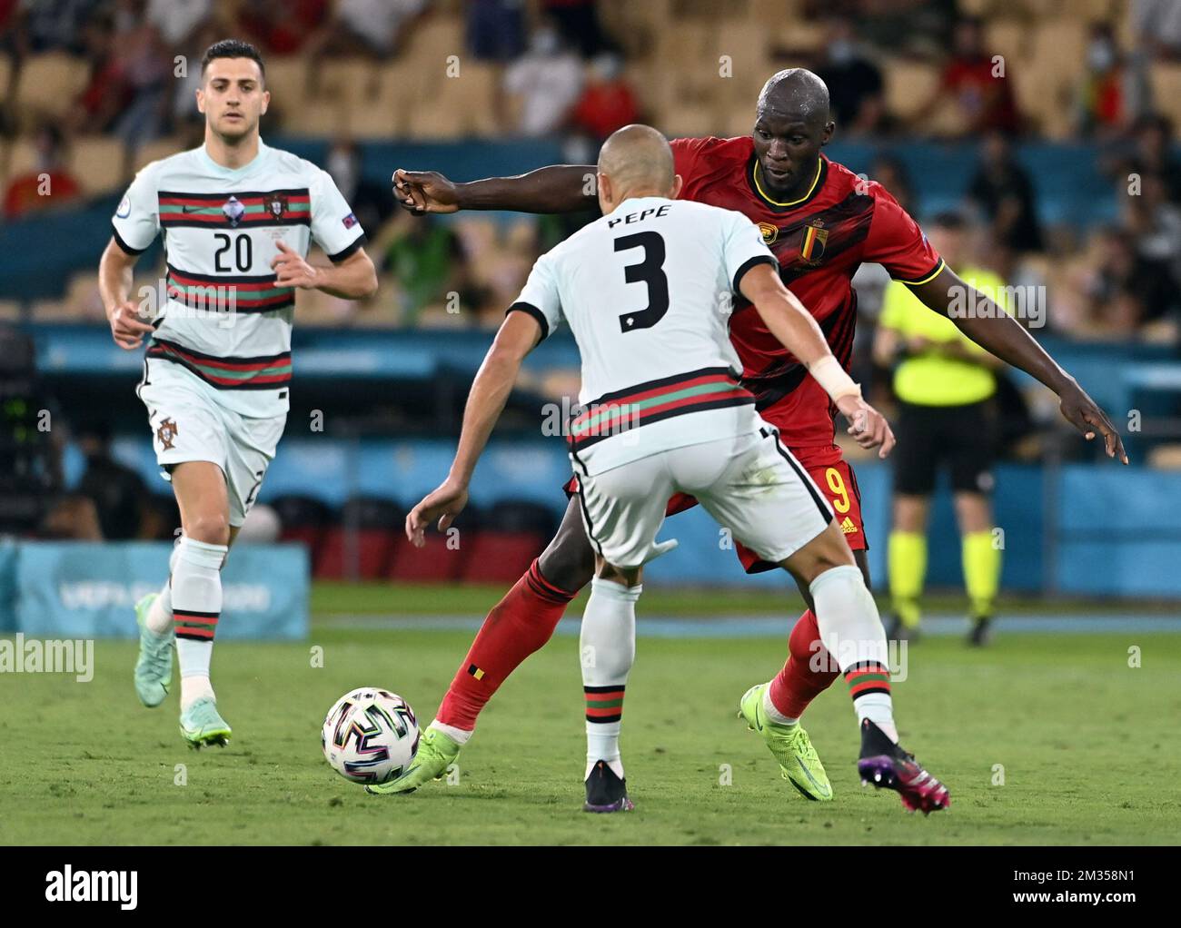 Portugal's Pepe and Belgium's Romelu Lukaku fight for the ball during ...
