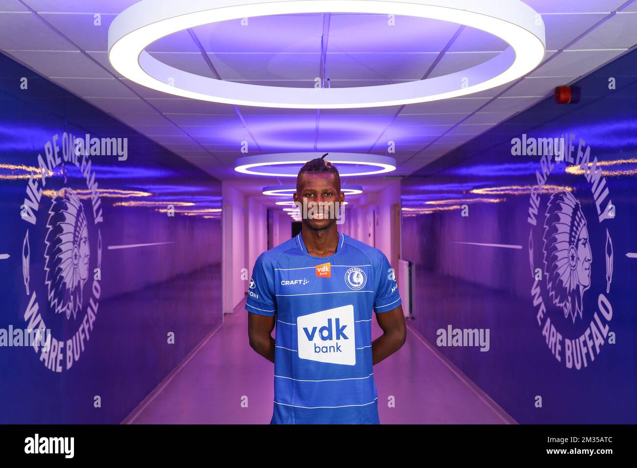 Vakoun Issouf Bayo poses for the photographer after signing with ...