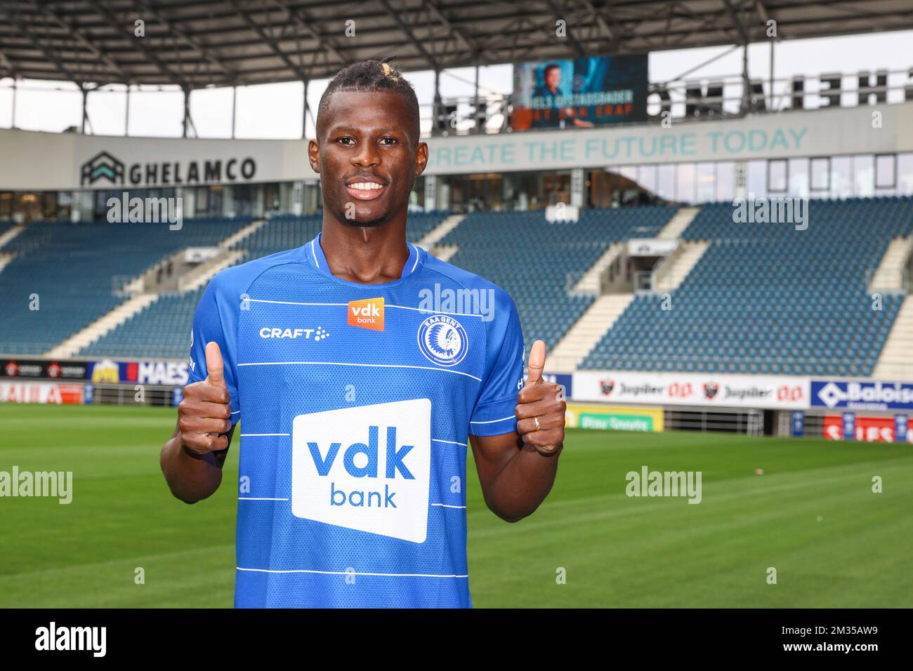 Vakoun Issouf Bayo poses for the photographer after signing with ...