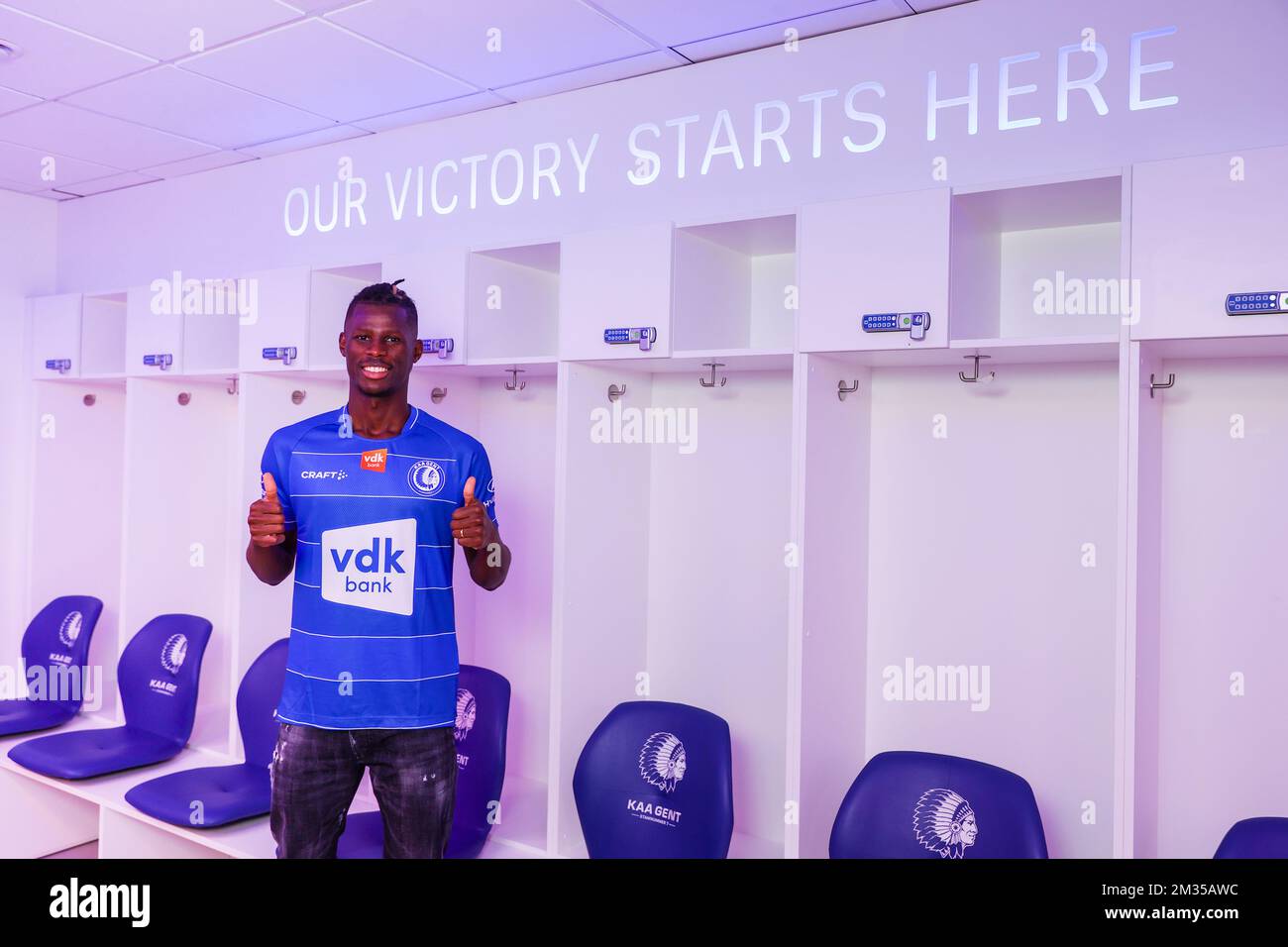 Vakoun Issouf Bayo poses for the photographer after signing with ...