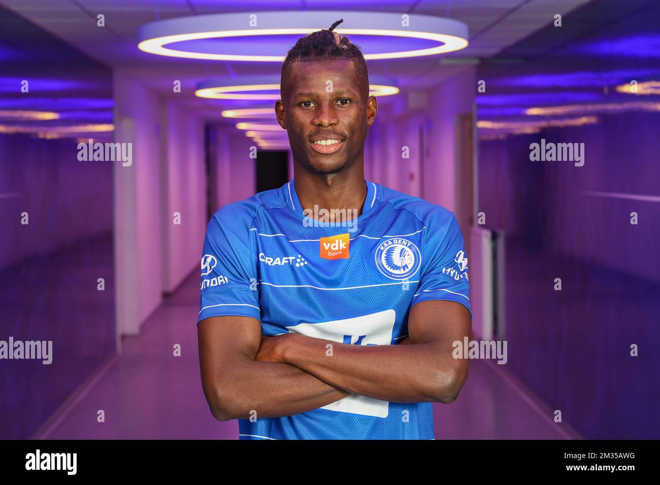 Vakoun Issouf Bayo poses for the photographer after signing with ...