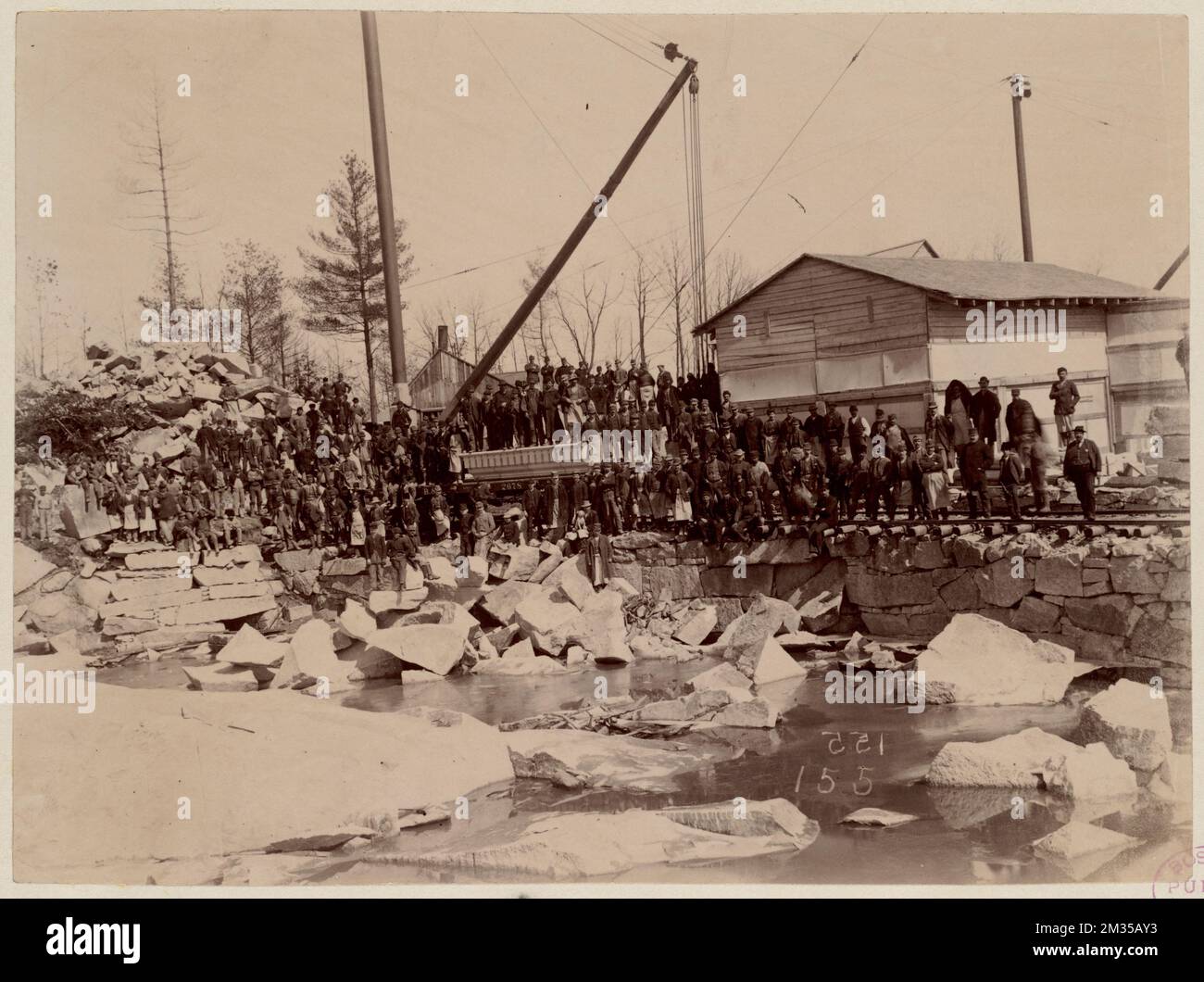 Granite cornerstone and workmen at Milford Quarry, construction of the ...