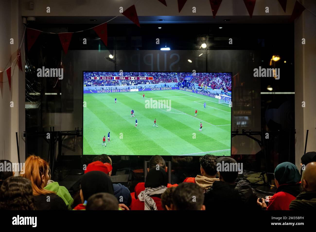 AMSTERDAM - Moroccan football supporters watch the semi-final match ...