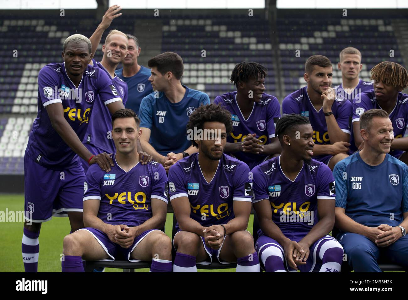 Players and staff pictured before a team picture, at the 2021-2022 ...