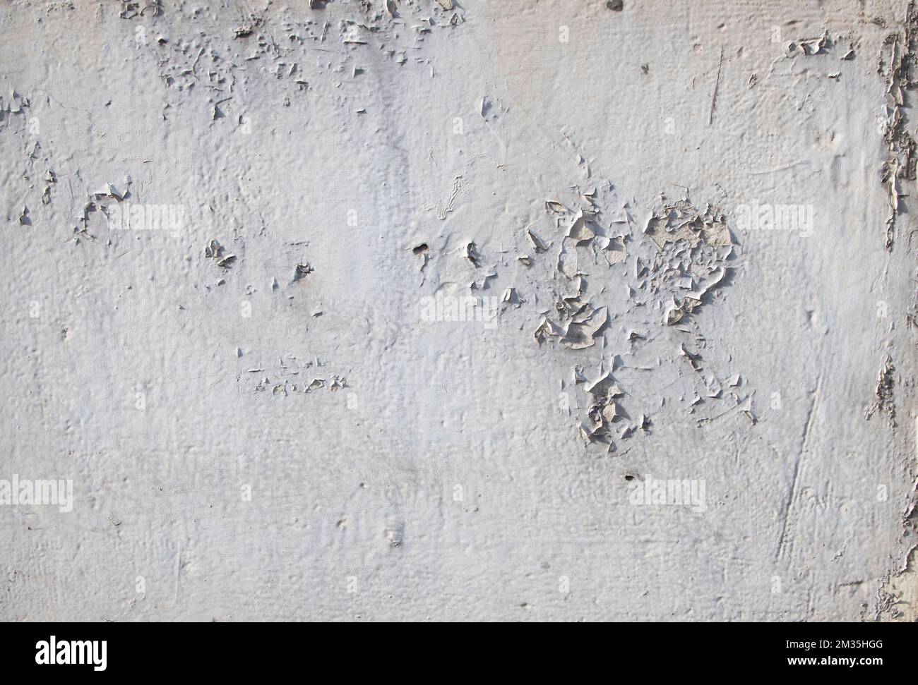 old plaster texture on a cement wall destroyed by weather and time ...