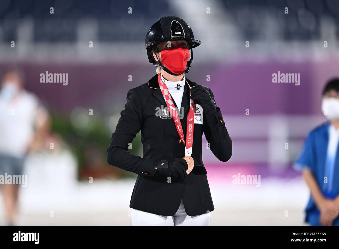 Paralympic jockey Manon Claeys , winner of the bronze medal celebrates ...