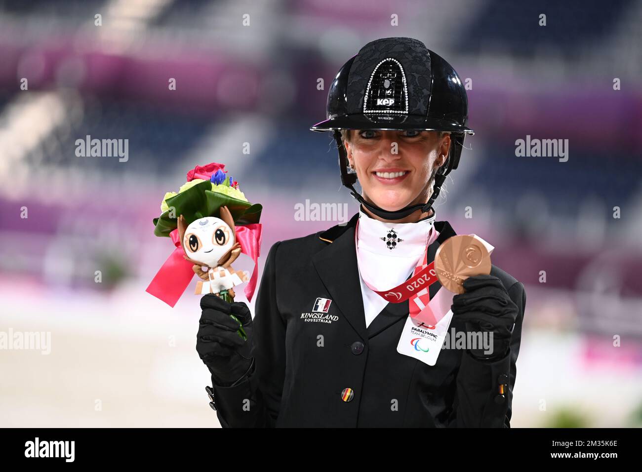 Paralympic jockey Manon Claeys, winner of the bronze medal celebrates ...