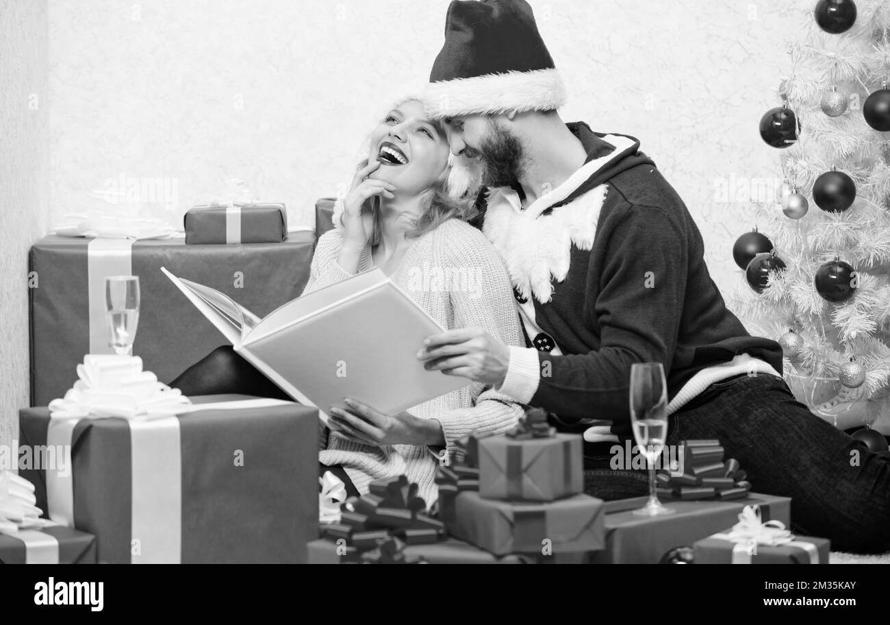 Couple in love enjoy christmas. Happy flashback. Family cuddle near ...