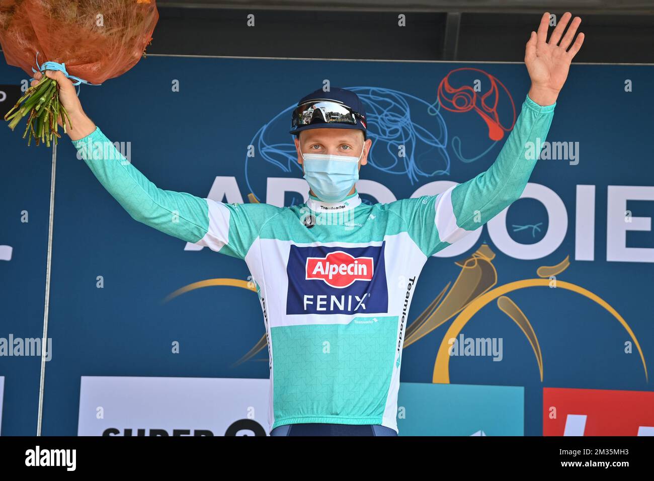 Belgian Tim Merlier of Alpecin-Fenix on the podium after winning stage ...