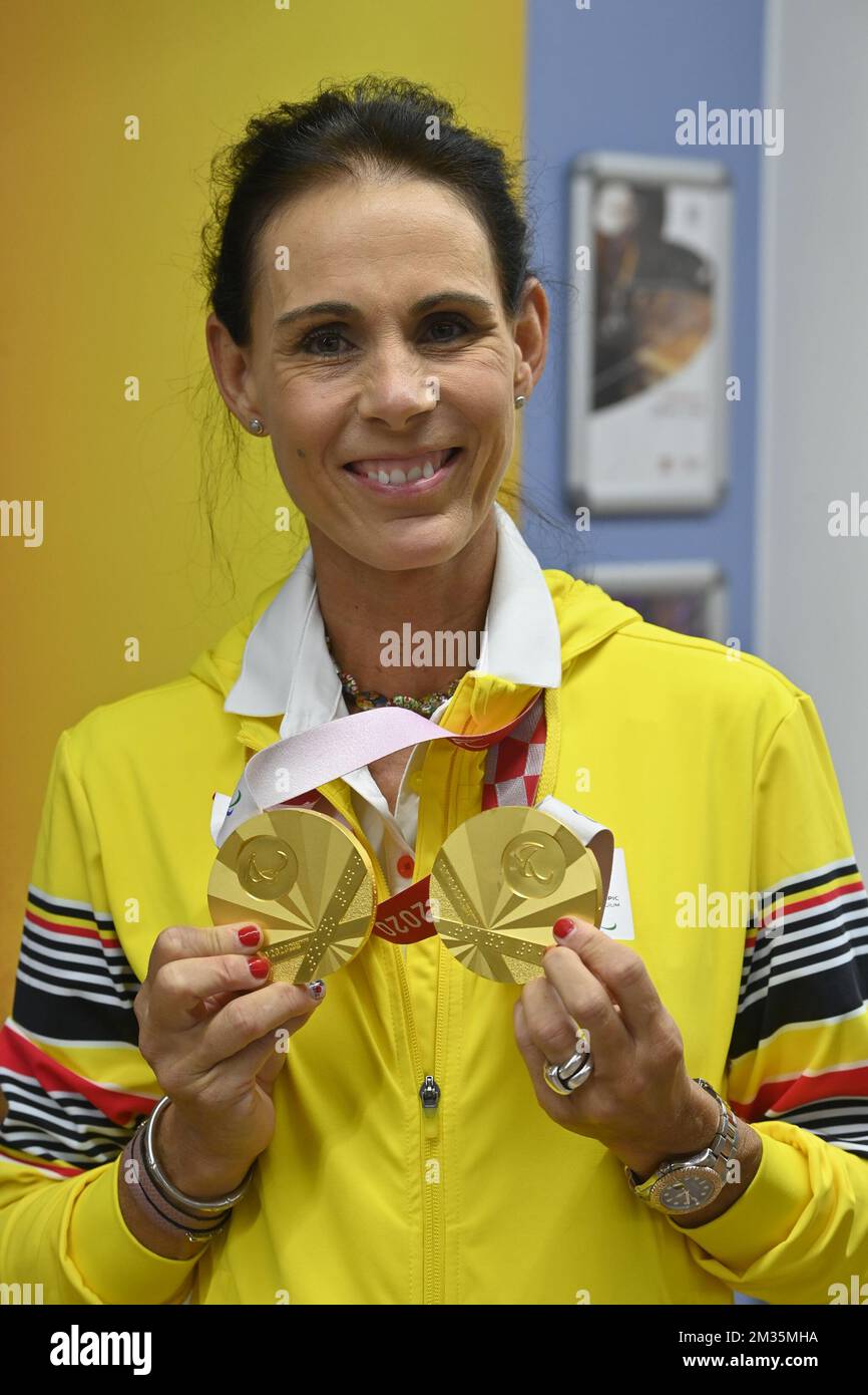 Belgian jockey Michele George and her two medals seen at the return of ...