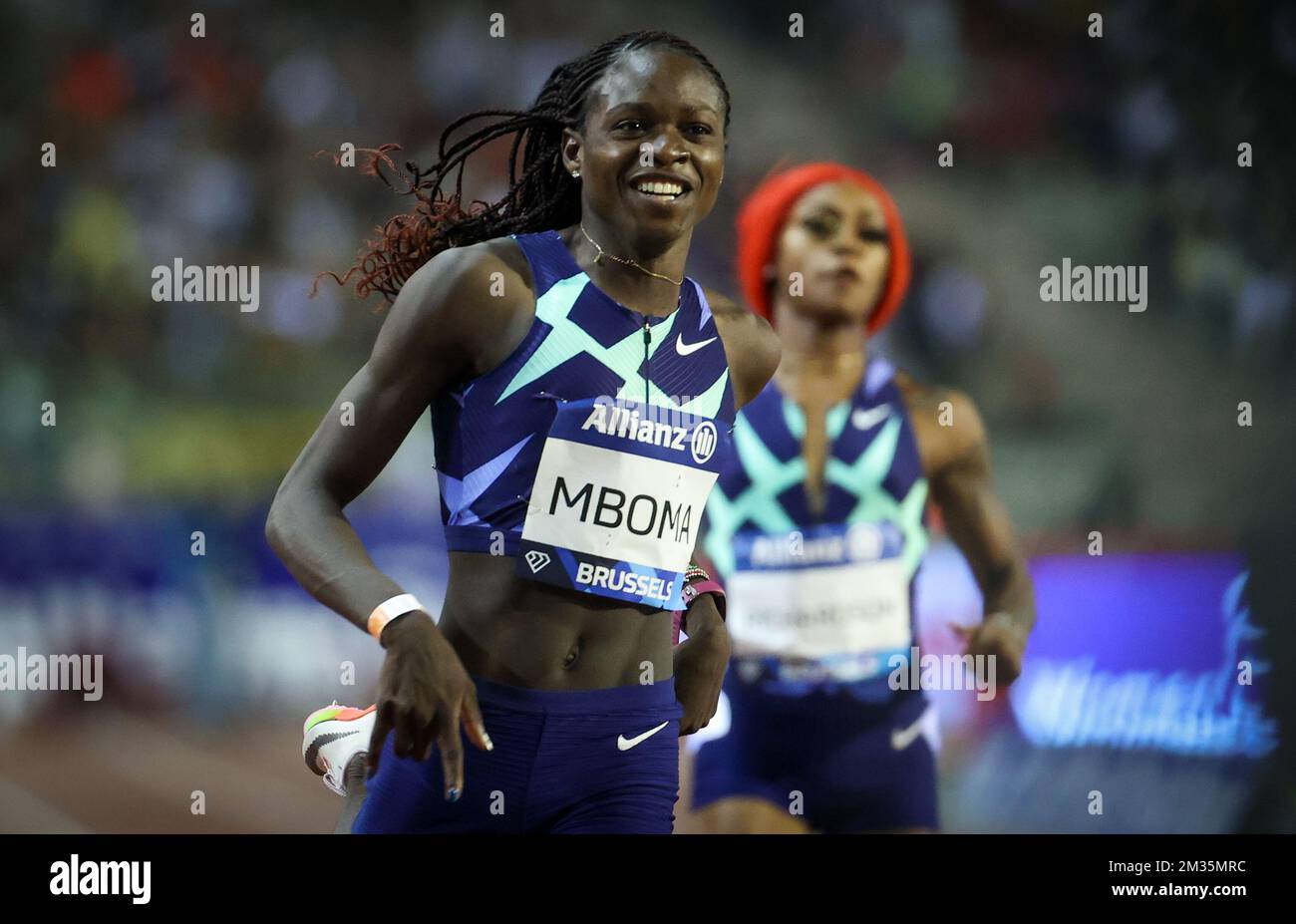 Christine Mboma celebrates as she crosses the finish line to win the ...