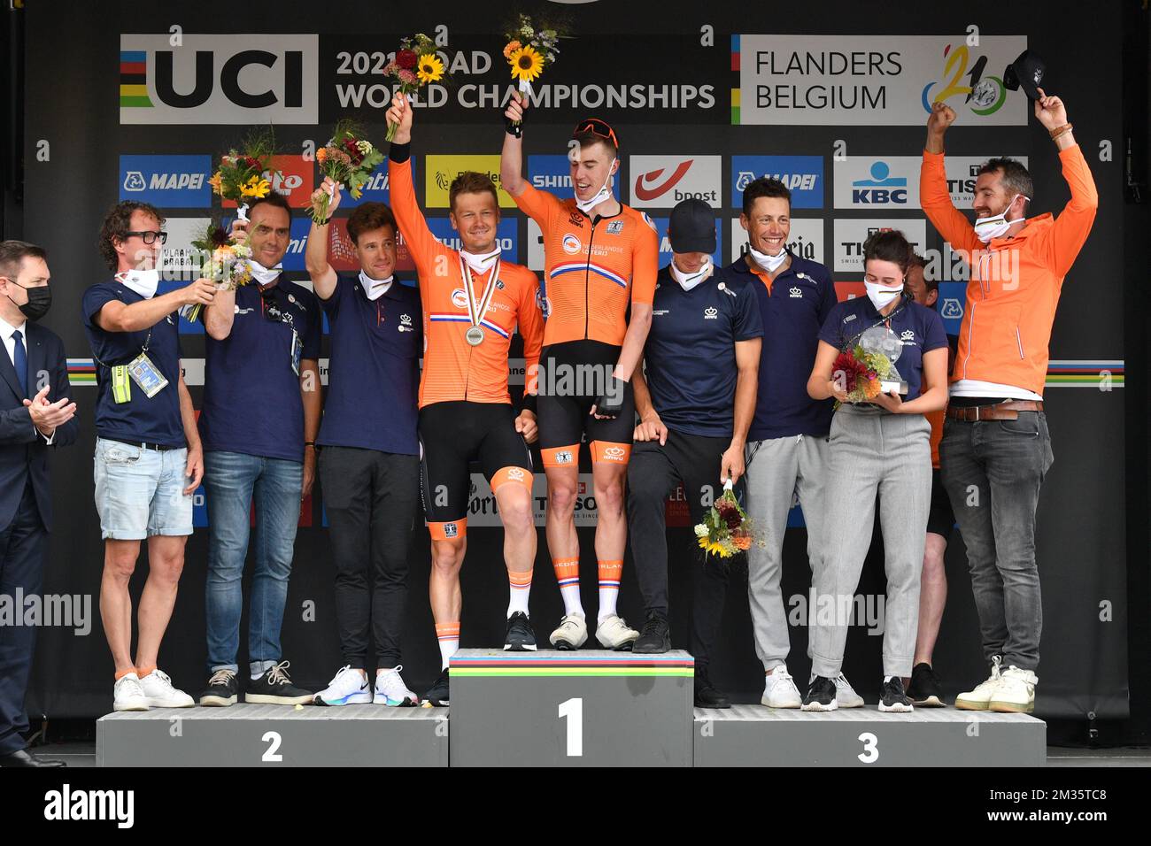 Dutch riders celebrate on the podium after the elite men road race of ...
