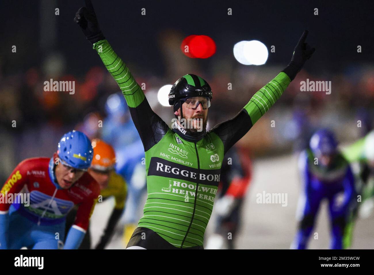 BURGUM - Gary Hekman cheers after winning the race of the men's peloton ...