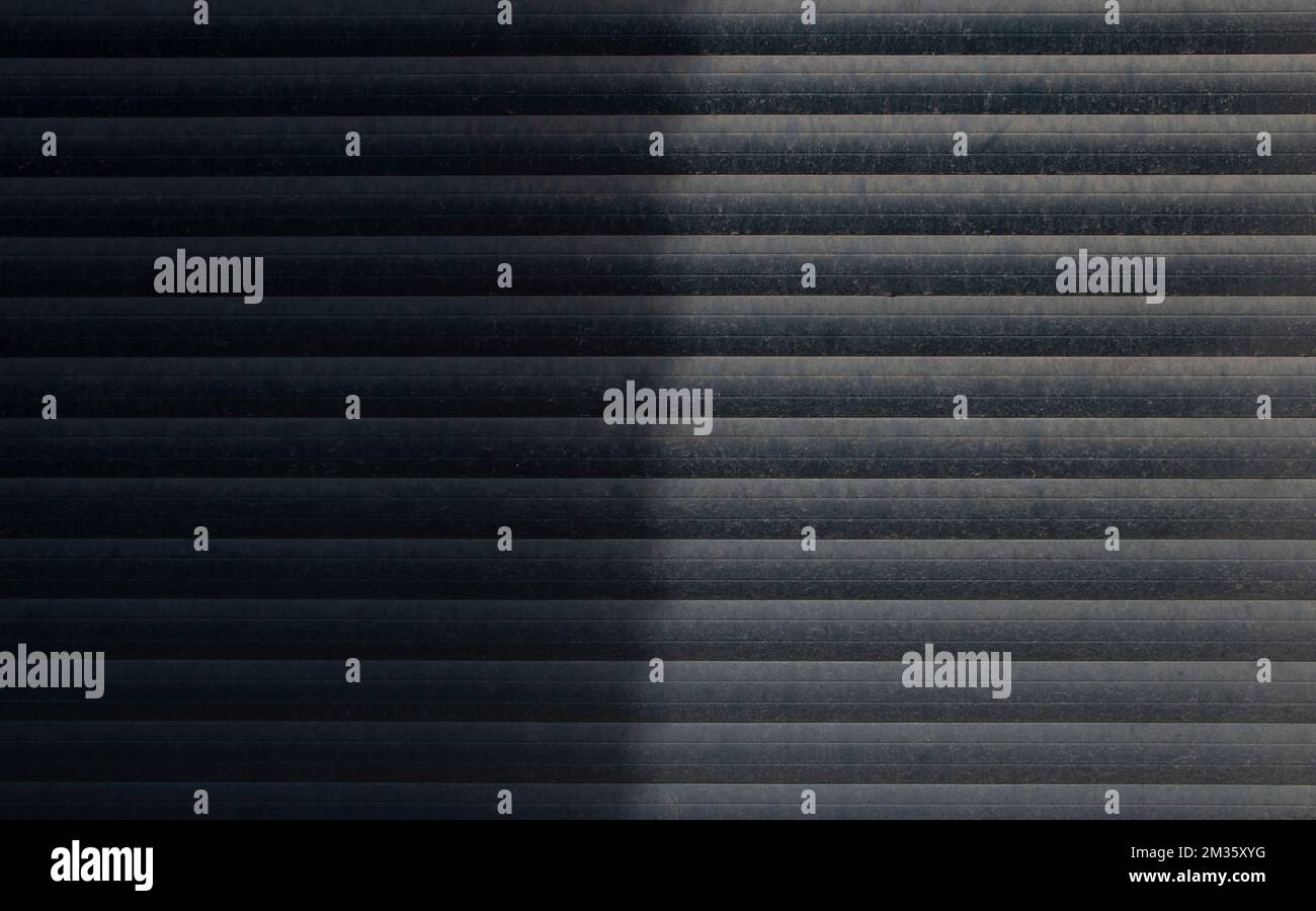 The texture of the old external blinds, with a vertical shadow. Traces ...