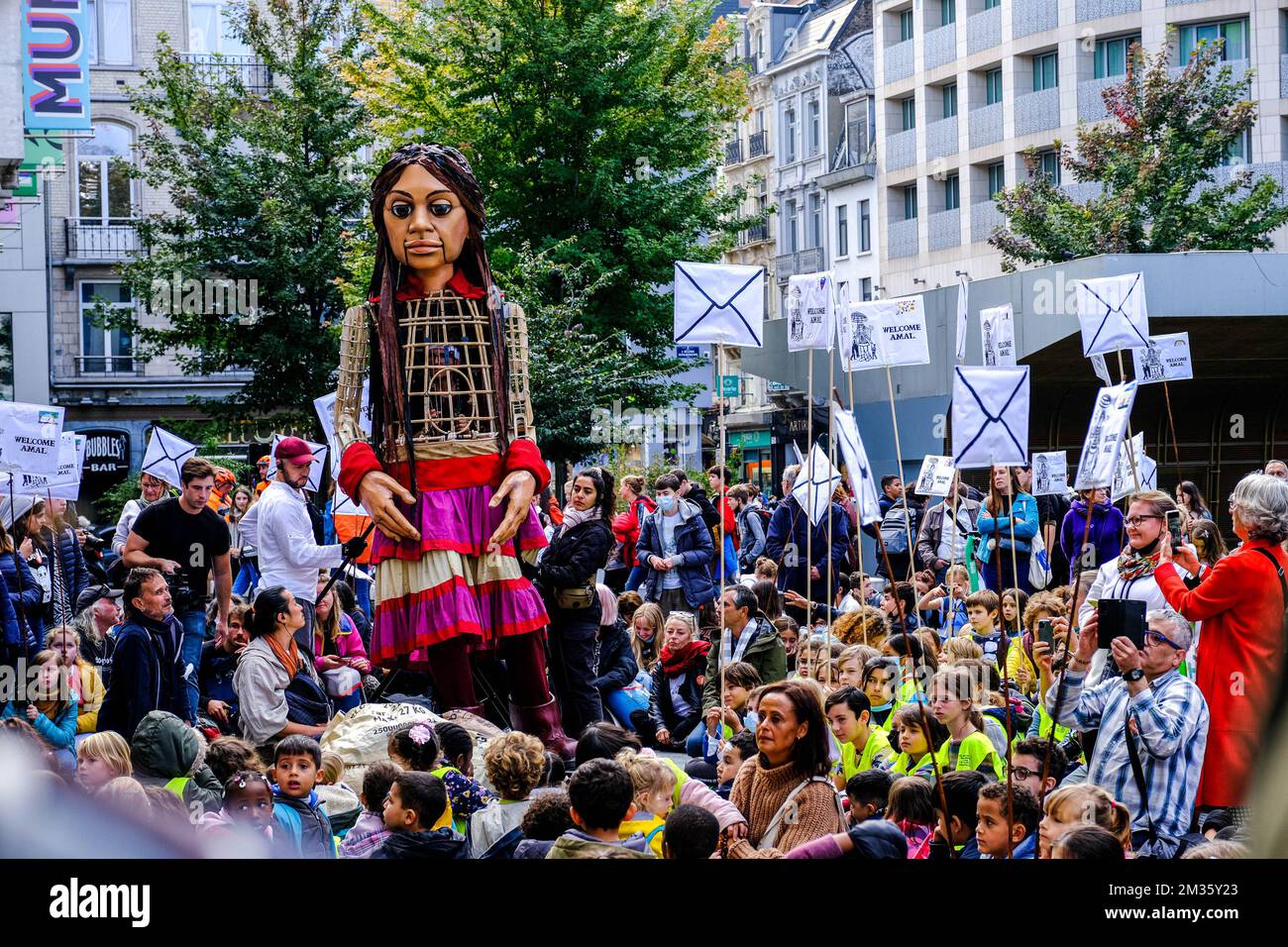 Giant puppet 'Little Amal' wanders in the city center of Brussels ...