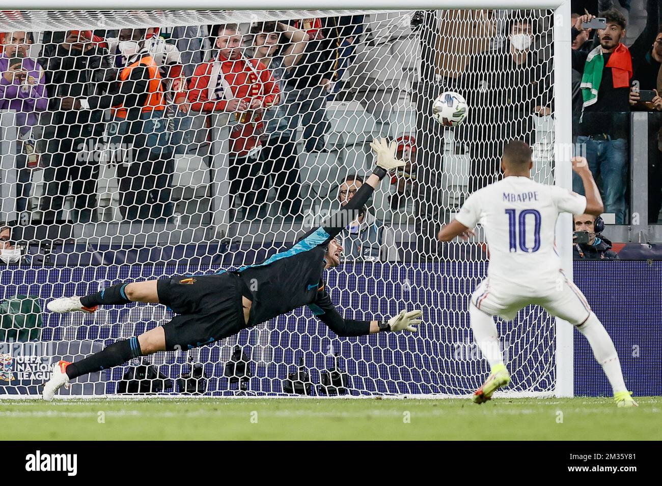 France's Kylian Mbappe scores from penalty during a soccer game between ...