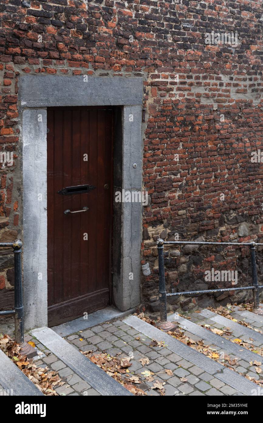 wooden door at the exit from the old house and stairs going down Stock ...