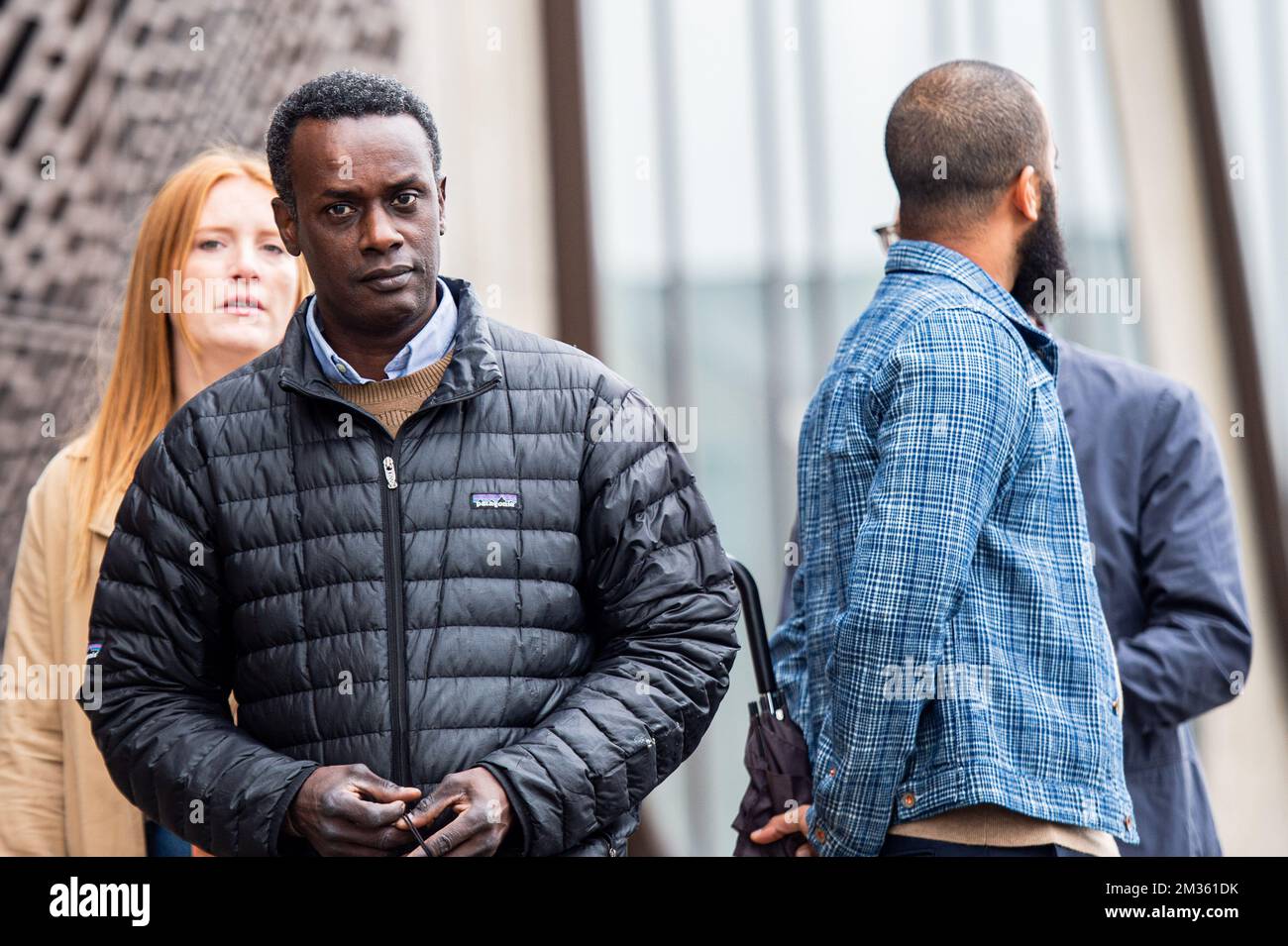 Sanda's father Ousmane Dia arrives for a session of the case against 18 ...