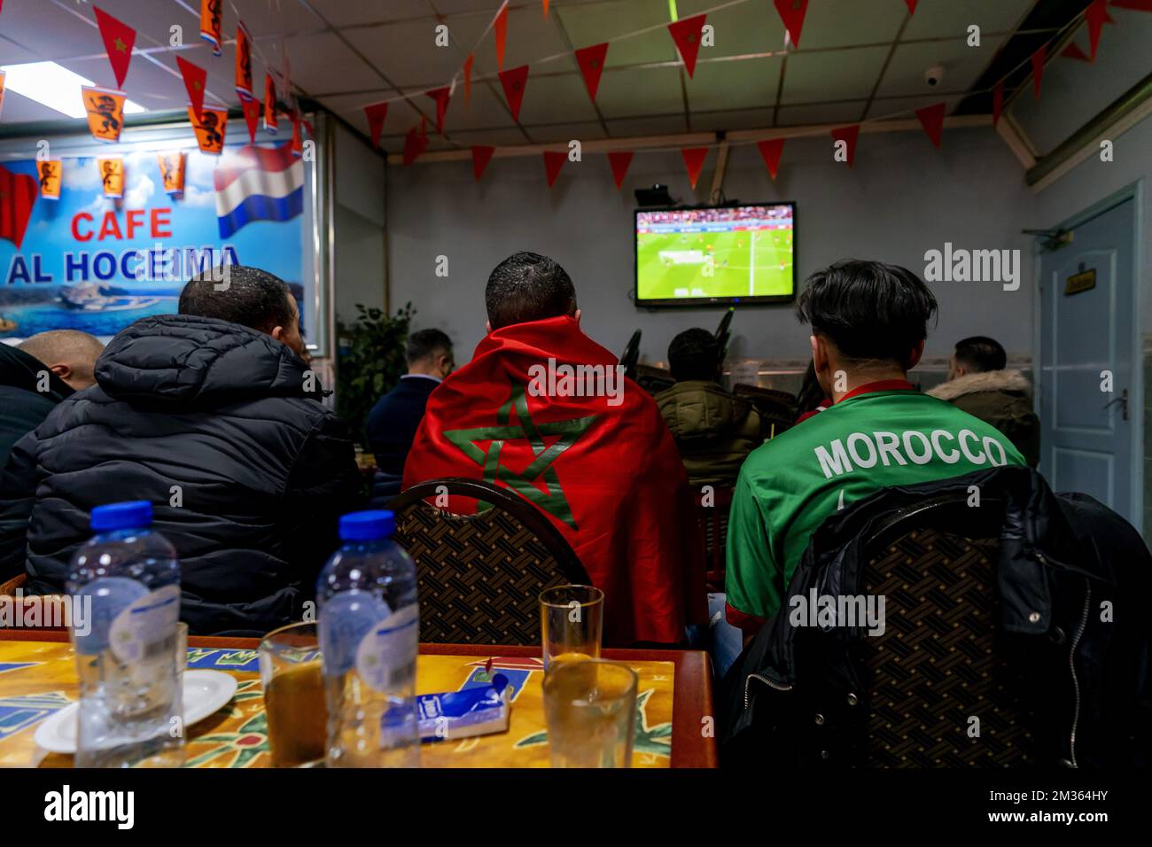 THE HAGUE - Moroccan football supporters watch the match in a Moroccan ...