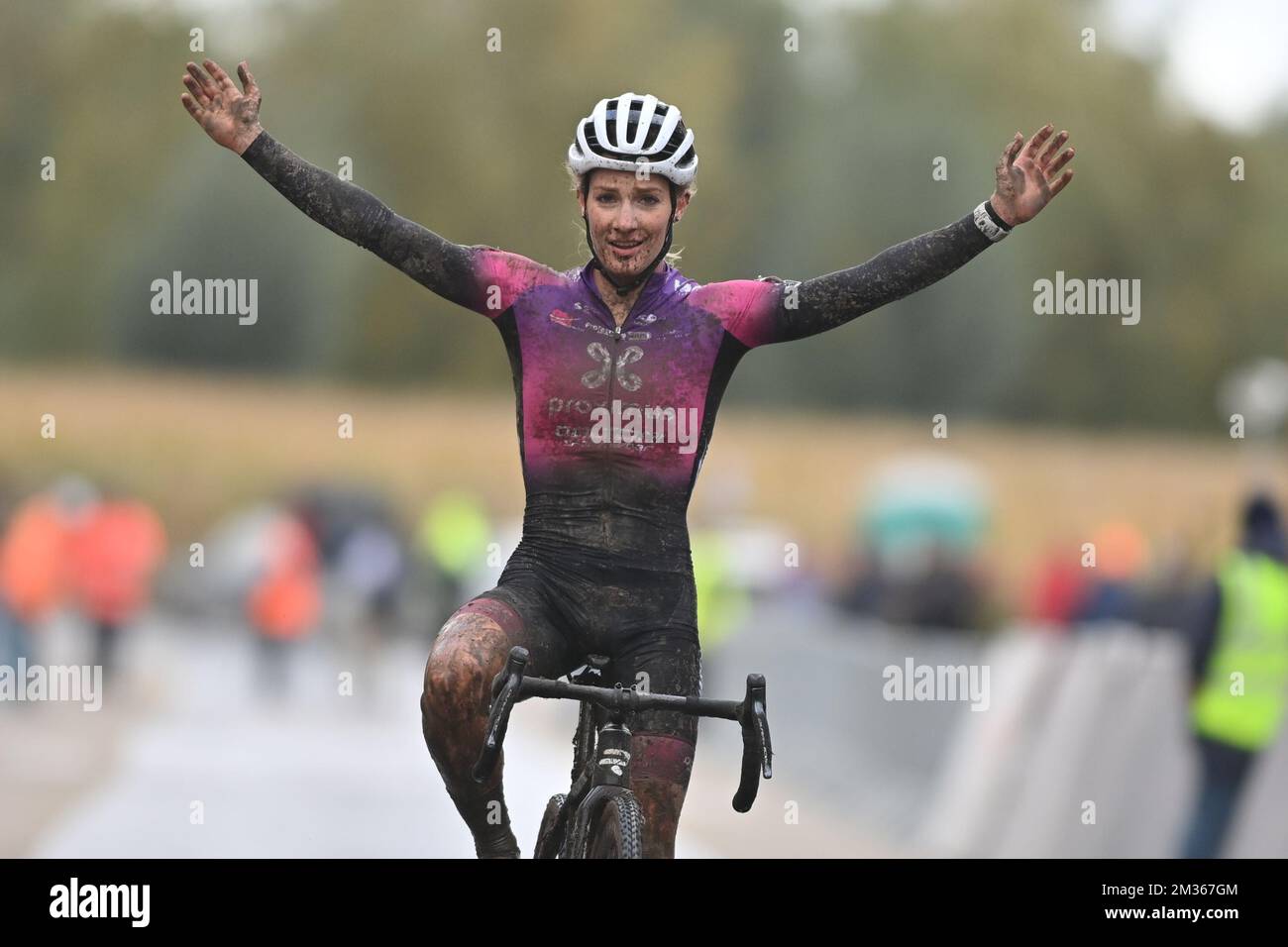 Belgian Alicia Franck celebrates as she crosses the finish line to win ...