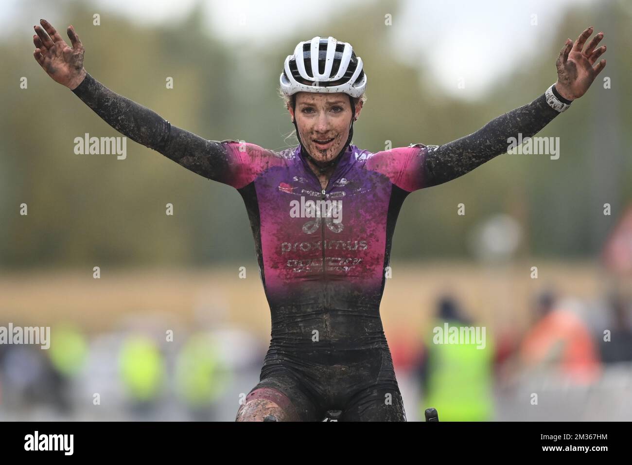 Belgian Alicia Franck celebrates as she crosses the finish line to win ...