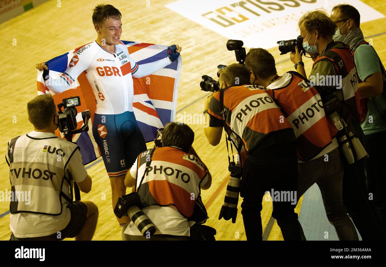 British Ethan Hayter poses for photographers after winning the Men's ...