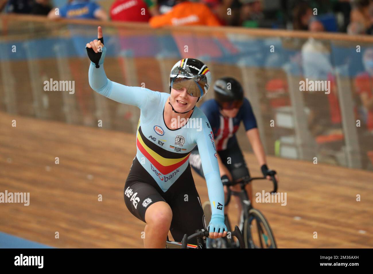 Belgian Lotte Kopecky celebrates as she crosses the finish line to win ...