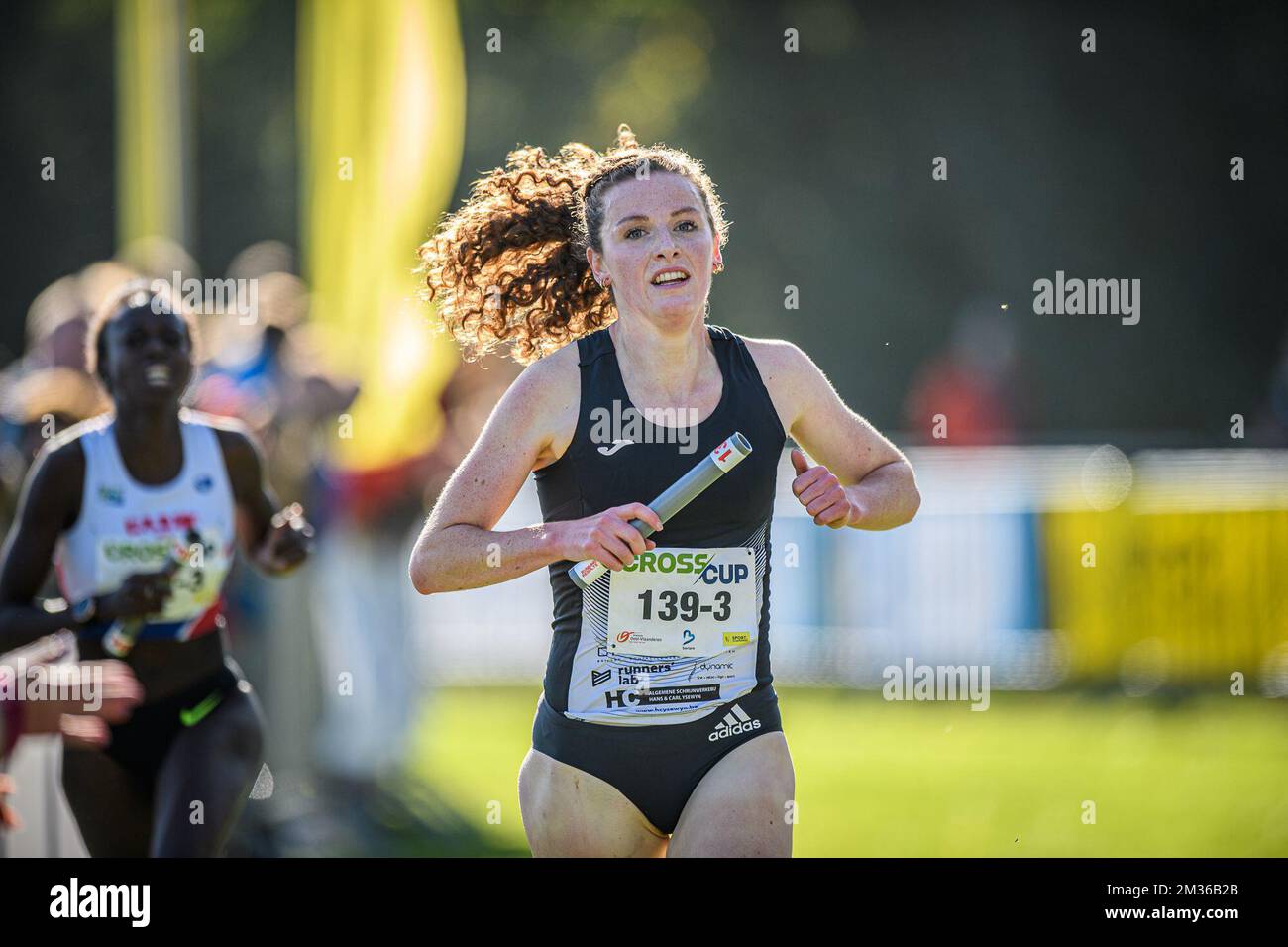 Belgian Lisa Rooms celebrates as she crosses the finish line to win the ...