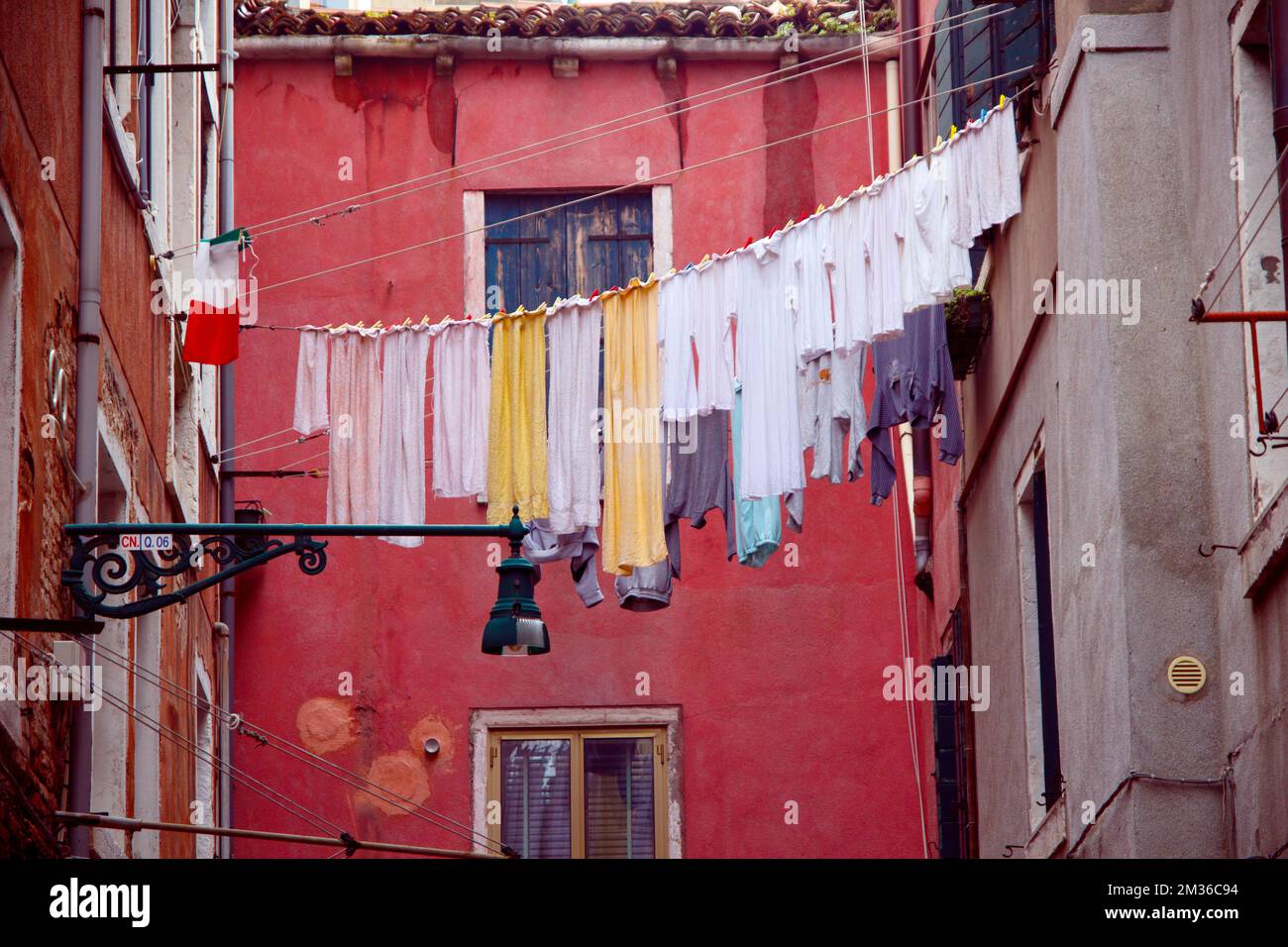 vintage style picture of an old alley with laundry lines in Venice ...