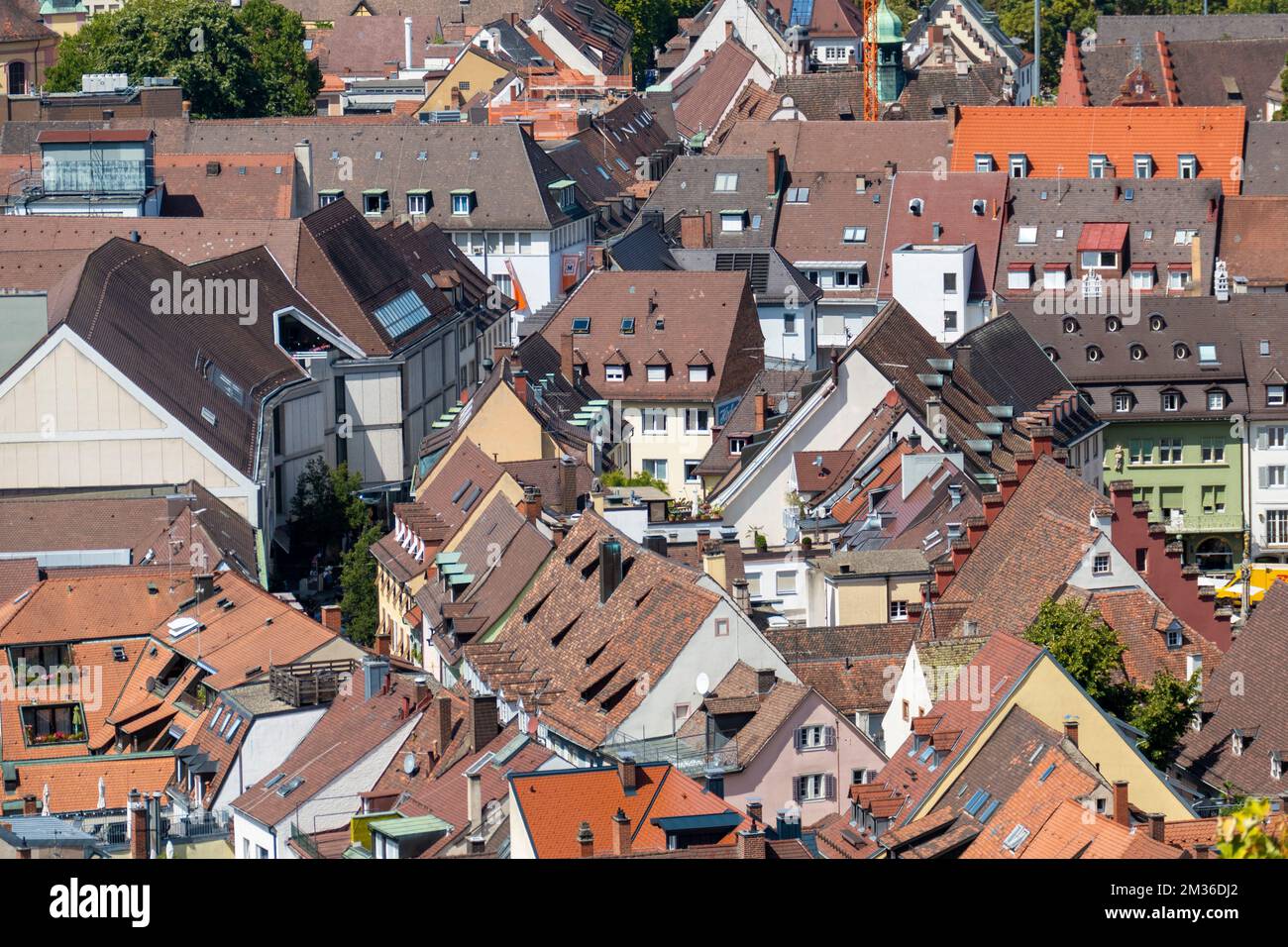 An aerial shot of the medieval buildings in Freiburg im Breisgau ...